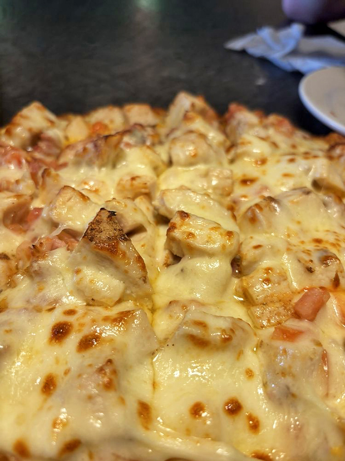 The Bigfoot Pizza lives up to its name with a hearty blend of toppings that would satisfy even the most elusive cryptid after a long day of avoiding photographers.