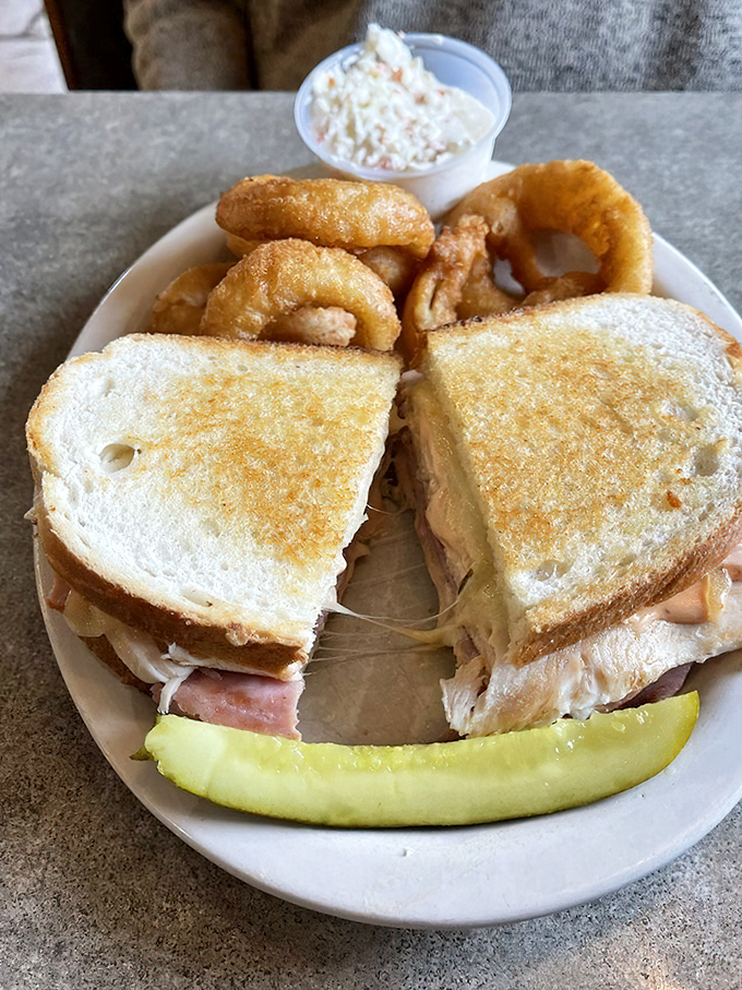 This sandwich isn't just stacked&mdash;it's architecturally sound. The melty cheese pulls away like it's auditioning for a food commercial.