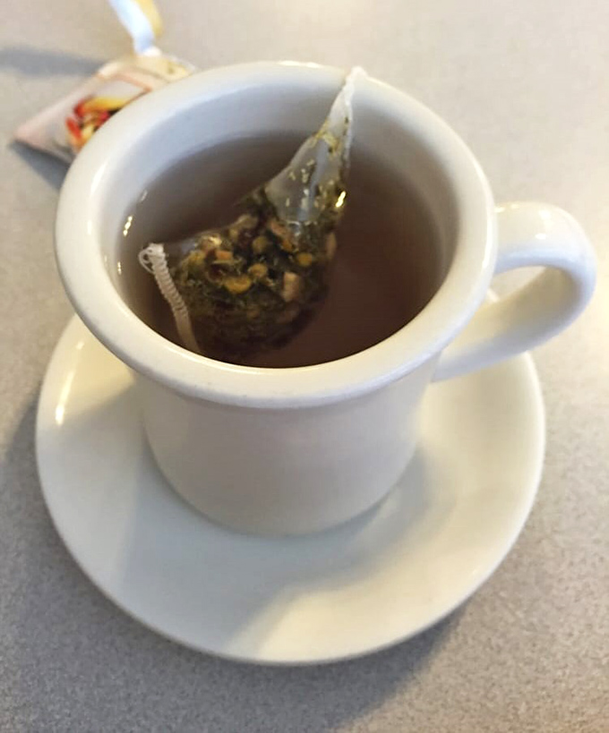 A simple cup of tea becomes a moment of zen amid breakfast chaos&mdash;the steam rising like morning fog over Delaware farmland.