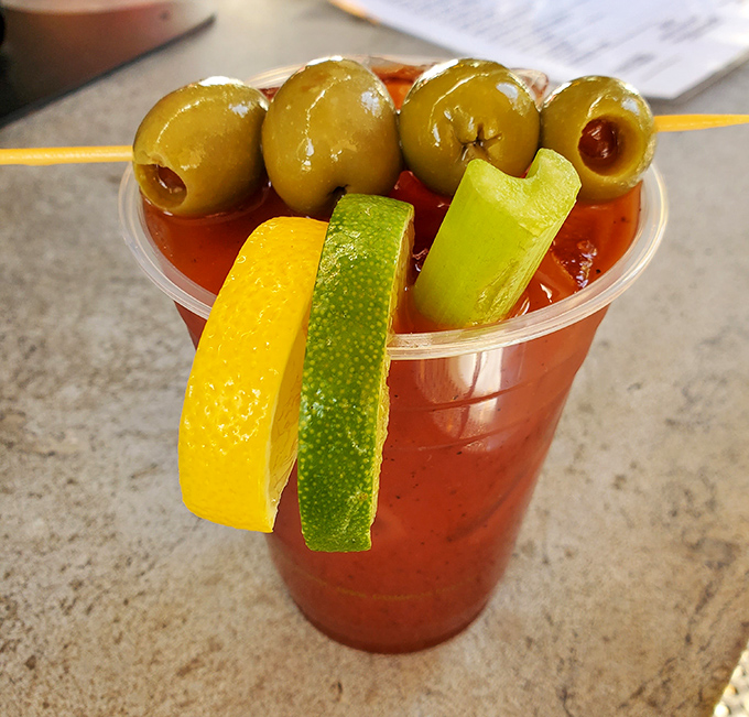 Not just a drink, but a meal in a glass &ndash; this Bloody Mary with its olive skewer is practically begging to be photographed before sipping.
