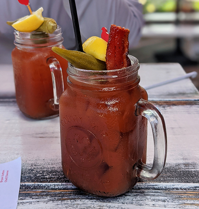 Their Bloody Mary comes fully loaded like a flavor grenade&mdash;complete with pickle, bacon, and enough garnishes to count as a small appetizer.
