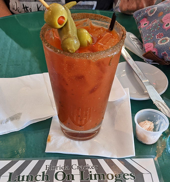 Three olives standing guard over a spicy tomato elixir that makes "hair of the dog" feel like a spa treatment.