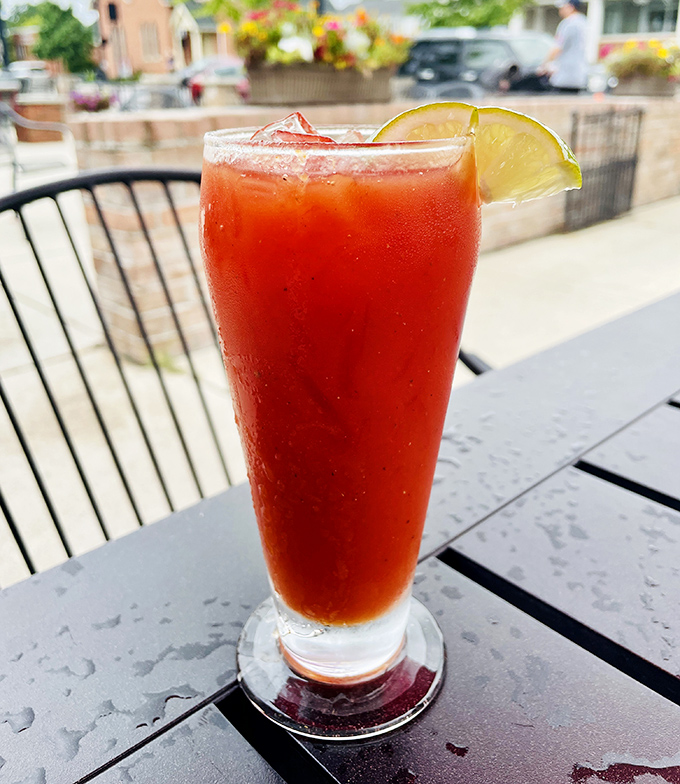 A Bloody Mary on the patio&mdash;spicy, refreshing, and garnished with lime. The perfect companion for weekend brunch conversations that stretch into afternoon.