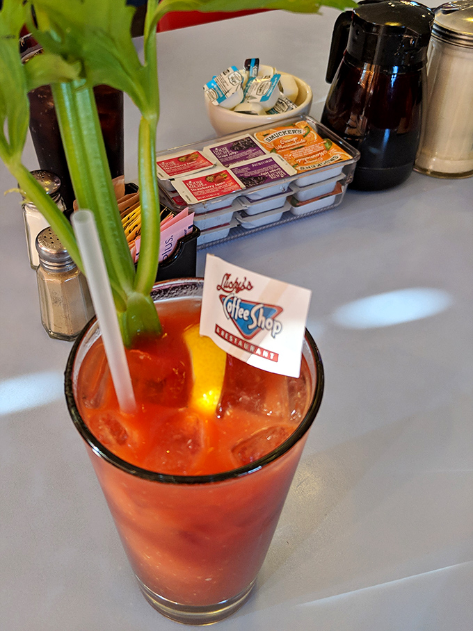 A Bloody Mary garnished with celery and a tiny Lucky's flag – because sometimes breakfast needs a little kick.