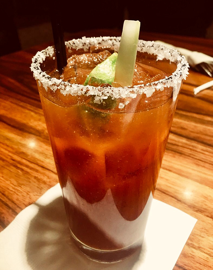 A Bloody Mary that means business, dressed up with enough garnish to count as a salad course.