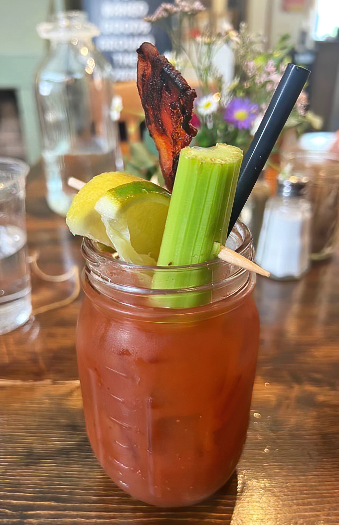 A Bloody Mary that's practically a meal unto itself—spicy, savory, and adorned with enough garnishes to count as a vegetable serving.