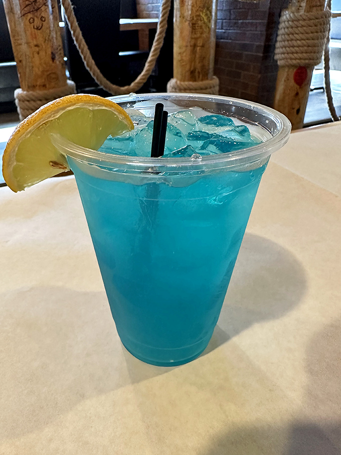 Electric blue lemonade that looks like it could power a small city. The perfect cooling counterpoint to spicy seafood adventures.