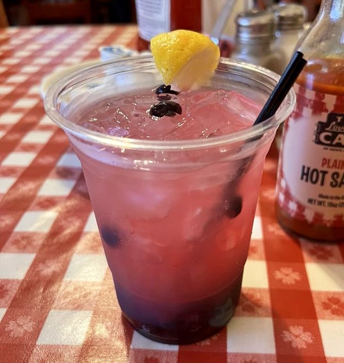This isn't just blueberry lemonade&mdash;it's summer in a glass, sitting pretty next to hot sauce for the perfect Southern contrast.