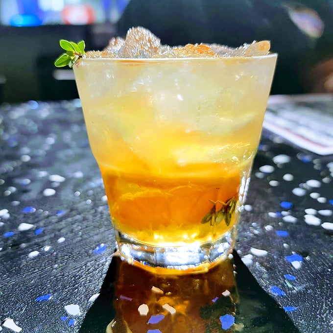 The bourbon thyme cocktail: where sophisticated spirits meet herb garden freshness in perfect liquid harmony.