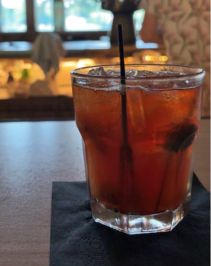 Wisconsin's state cocktail in its natural habitat. This brandy Old Fashioned isn't just a drink—it's practically a diplomatic passport in the Badger State.