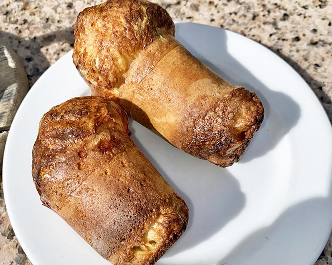 These golden popover-style rolls aren't just bread; they're edible hot air balloons that transport you to carb paradise.