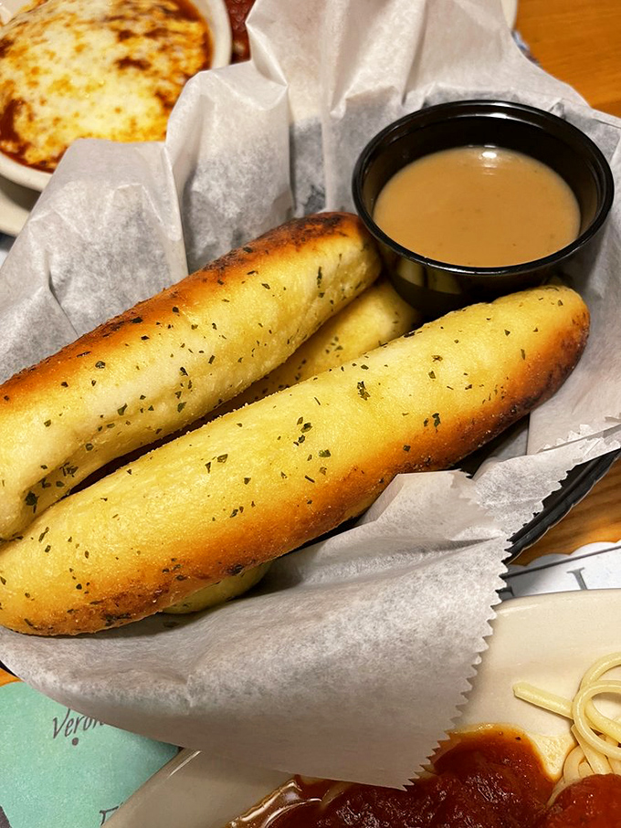 These breadsticks aren't just appetizers&mdash;they're diplomatic envoys from Carb Country. Golden, herb-flecked, and ready for their dipping destiny.