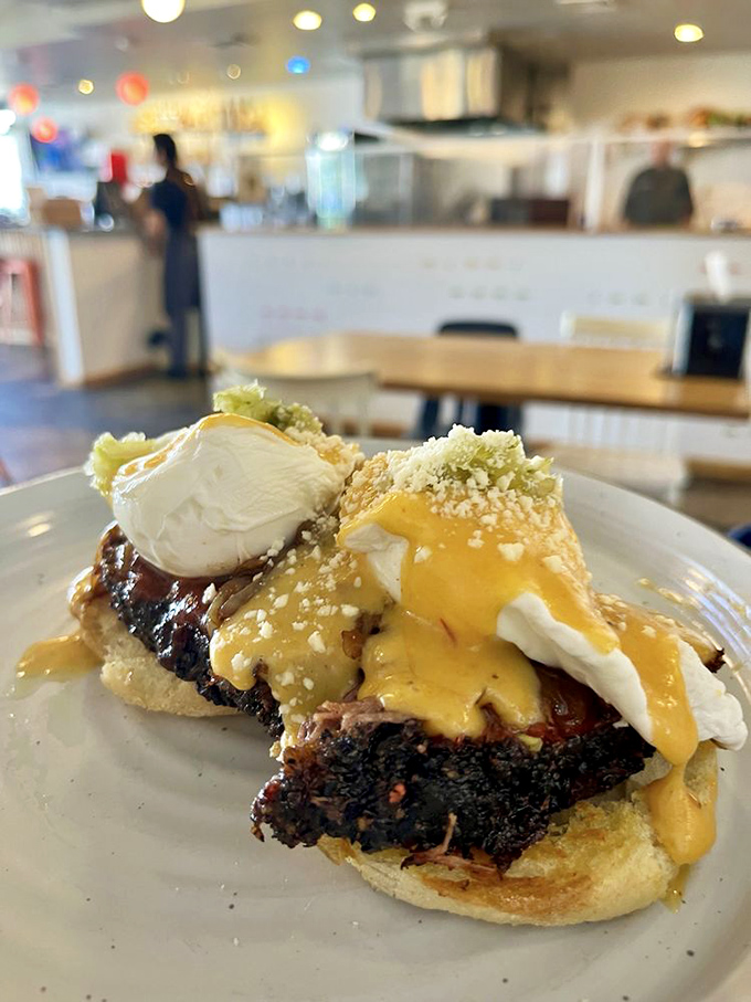 Barbecue eggs benedict&mdash;where breakfast meets smoke in a morning revelation topped with hollandaise that should probably be illegal.