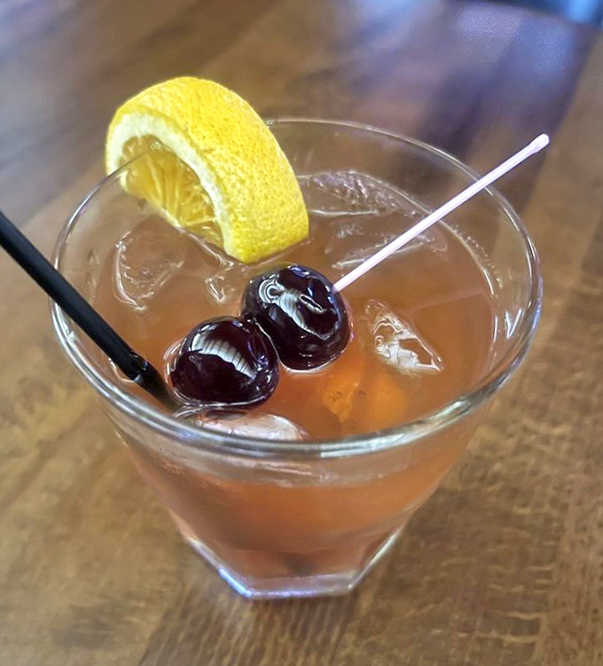 Even the cocktails at Jocko's come without pretense—just booze, fruit, and ice in perfect harmony. Those cherries aren't garnish; they're the prize at the bottom.