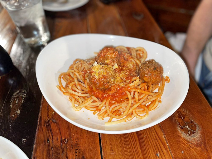 Bucatini with meatballs&mdash;the pasta with a hole in the middle, perfect for maximum sauce delivery. Engineering meets art meets lunch.