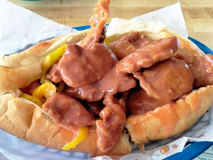 Buffalo chicken meets submarine roll in a spicy liaison that proves some of life's best relationships are the messiest ones.