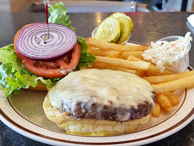 Sometimes the best burgers come from places that understand comfort food fundamentals perfectly.