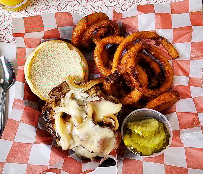 Not all heroes wear capes &ndash; some come with melted cheese, caramelized onions and perfect onion rings. This burger deserves its own theme music.