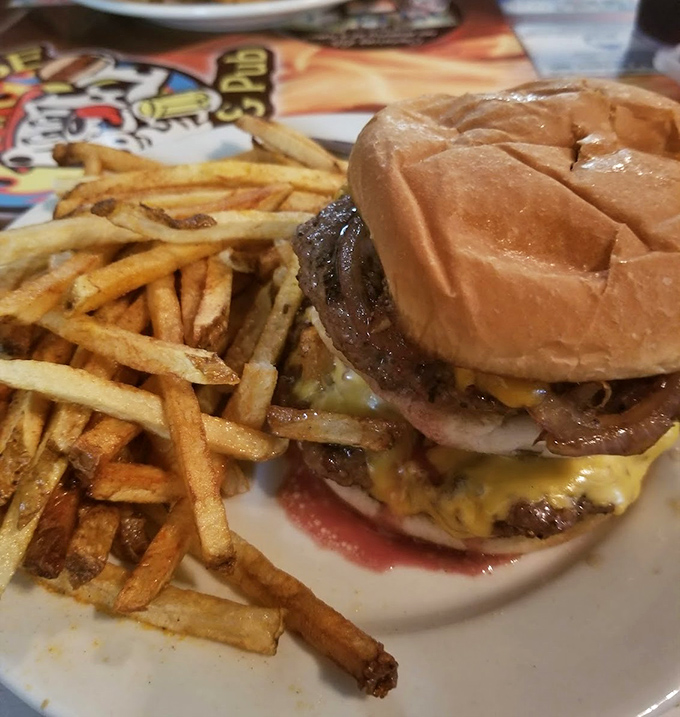 Not just a burger, but a testament to the power of proper beef-to-bun ratio. Those fries look like they were individually coached to golden perfection.