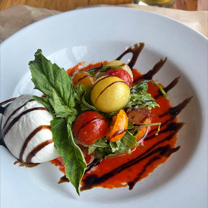 This burrata salad is summer on a plate&mdash;creamy cheese, vibrant tomatoes, and fresh basil creating a symphony of Mediterranean flavors.