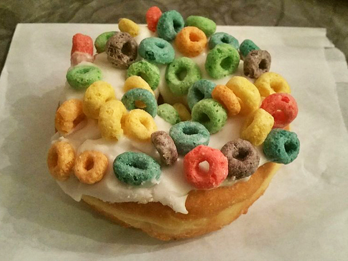 Childhood nostalgia meets adult indulgence: a buttermilk donut crowned with Fruit Loops that somehow makes perfect sense.