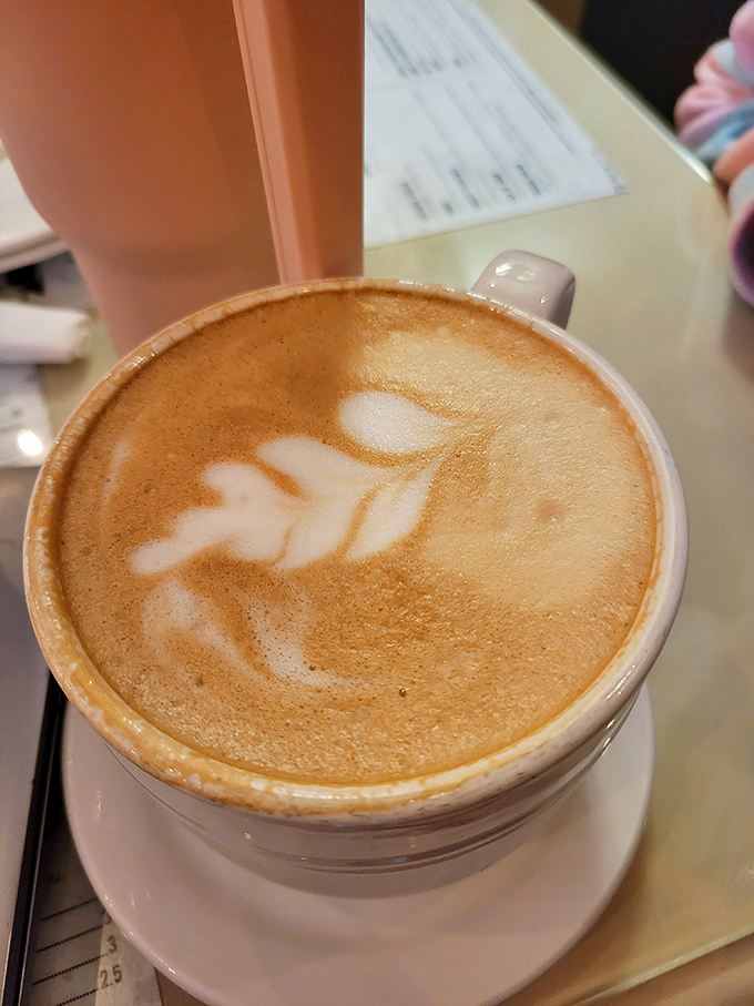 That perfect cappuccino moment when foam art meets your need for caffeinated happiness.