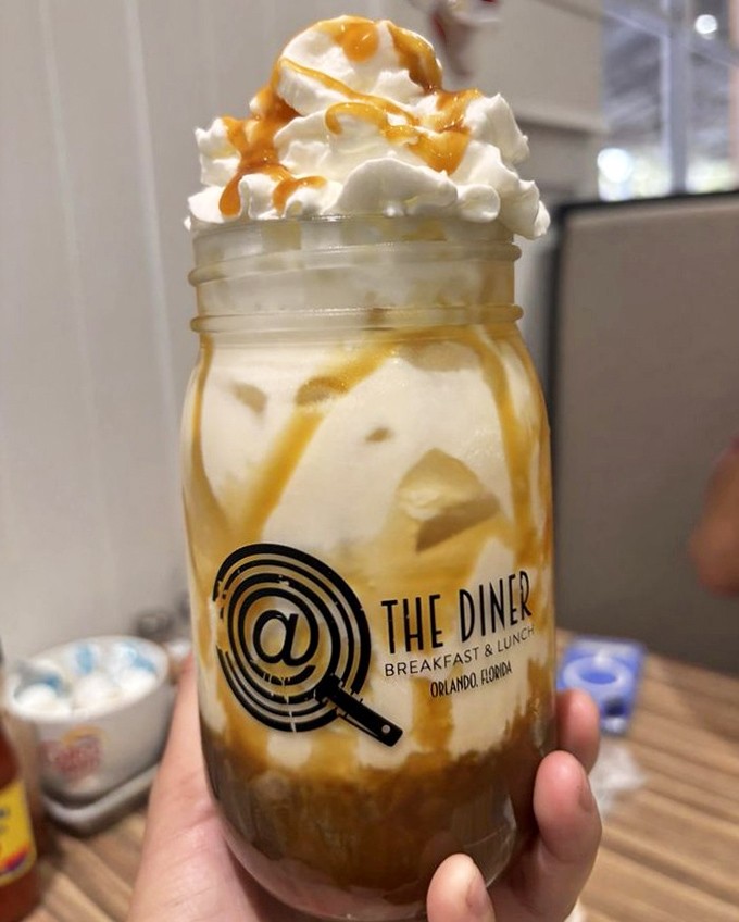 Mason jar presentation isn't just for Pinterest—this caramel-drizzled latte is the caffeinated hug your morning desperately needs.