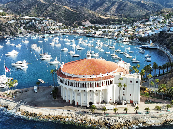 The Casino's circular silhouette commands Avalon Harbor, its white fa&ccedil;ade gleaming like a wedding cake that somehow grew to architectural proportions.