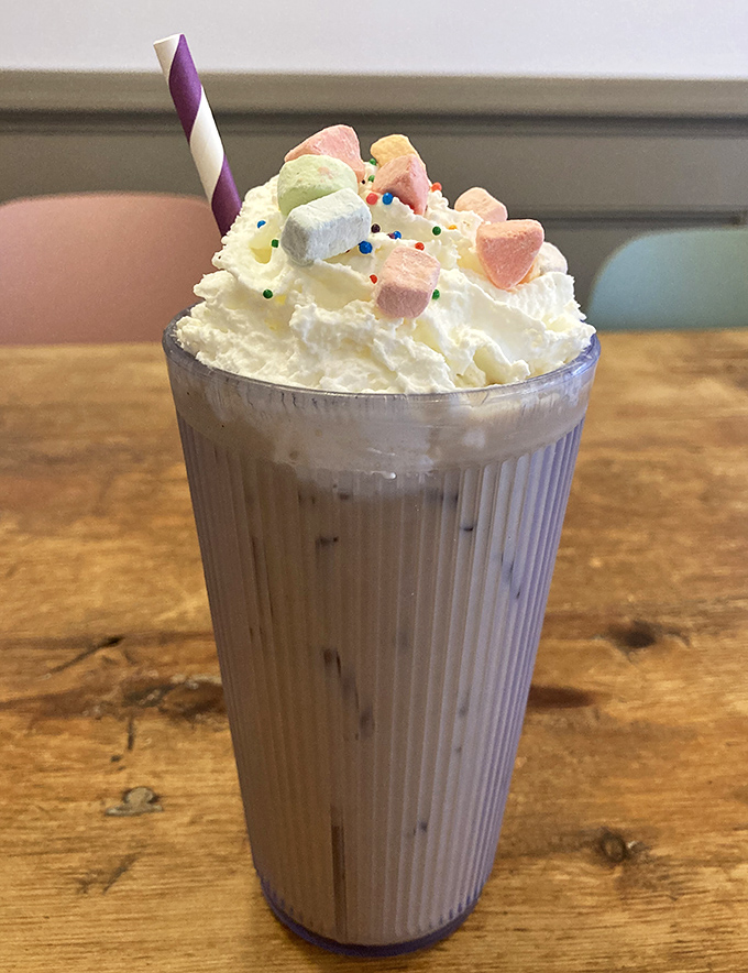 Childhood meets sophistication in this cereal milk latte topped with whipped cream and colorful marshmallows. Your inner child is doing a happy dance.