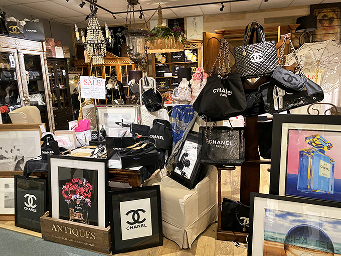 Fashion becomes art in this Chanel corner where vintage bags and framed prints transform luxury into collectible history.