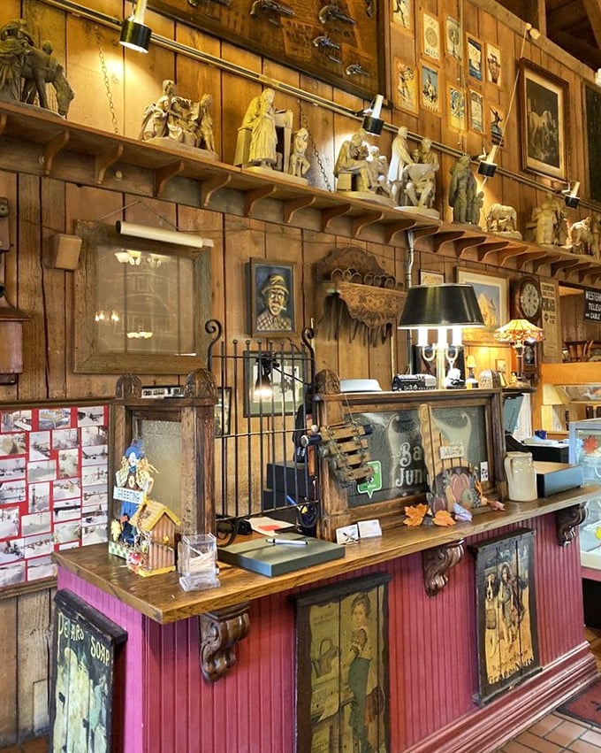 The check-out counter doubles as a museum of Americana, where figurines and vintage signs watch over your pie selections with silent approval.