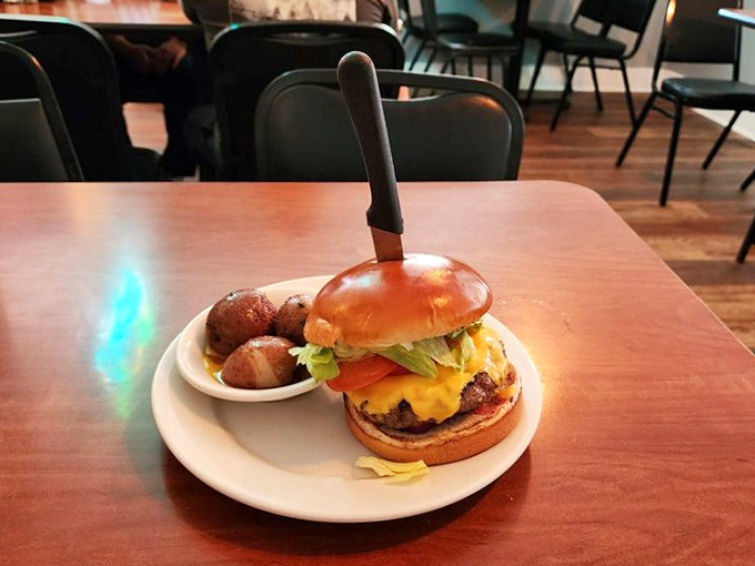 The Point Burger proves that even in seafood paradise, sometimes a perfectly executed cheeseburger with new potatoes hits the spot.