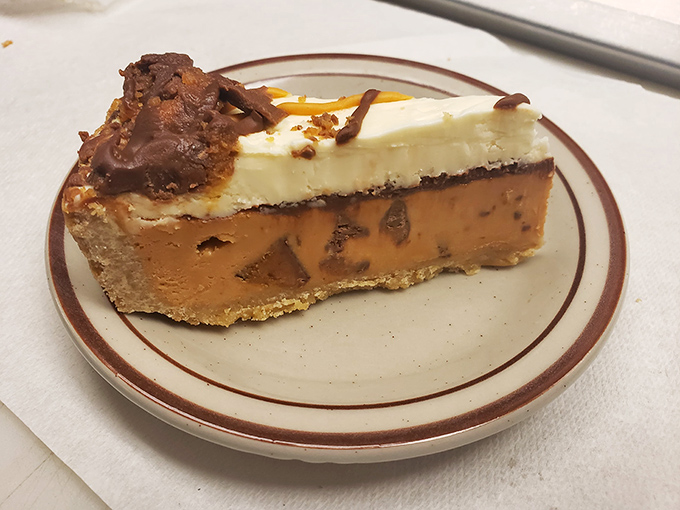 A slice of Reese's cheesecake that makes you wonder if sharing really is caring. Spoiler alert: it isn't.