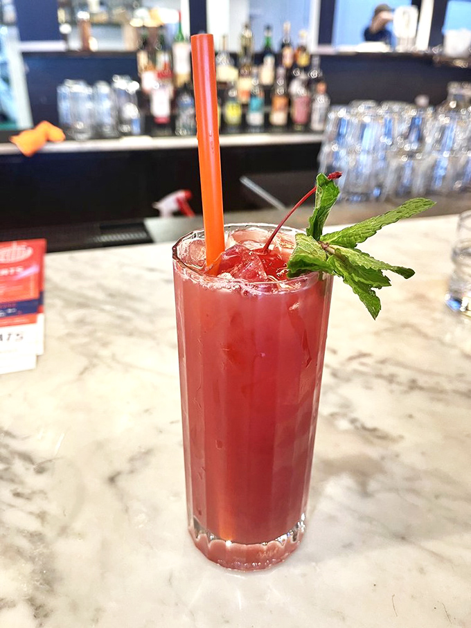 Not just a drink but a vibrant celebration in a glass, where cherry and lime perform a refreshing tango for your taste buds.