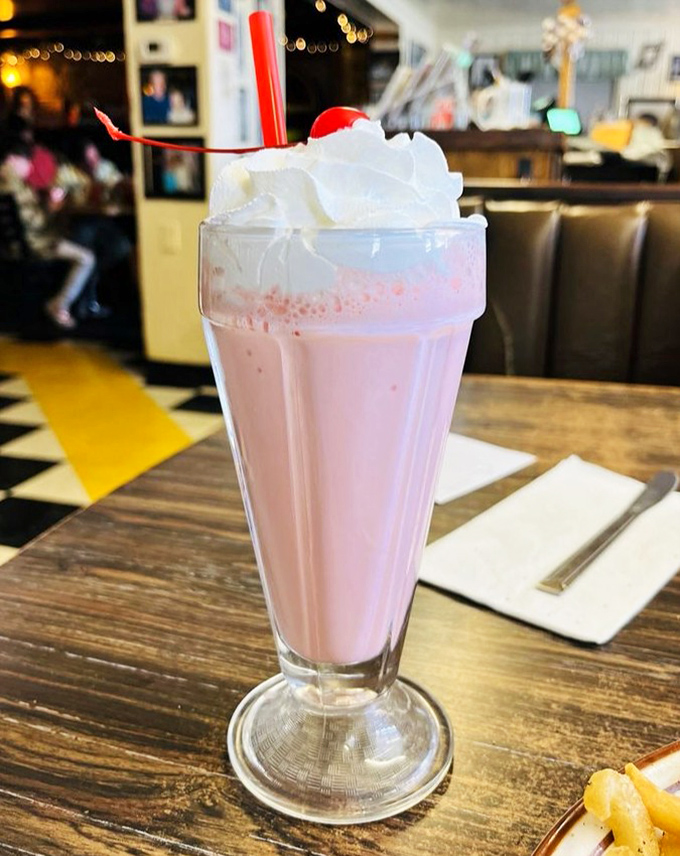 This strawberry shake isn't just Instagram-worthy&mdash;it's a frothy, creamy masterpiece topped with whipped cream and a cherry on top. Pure nostalgia in a glass.