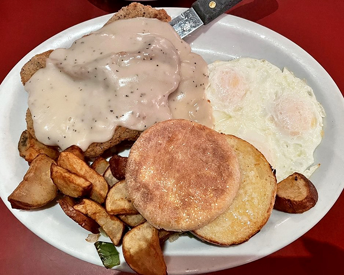 Country-fried steak swimming in gravy with sunny-side eggs&mdash;the breakfast equivalent of a warm hug from your favorite aunt who never counted calories.