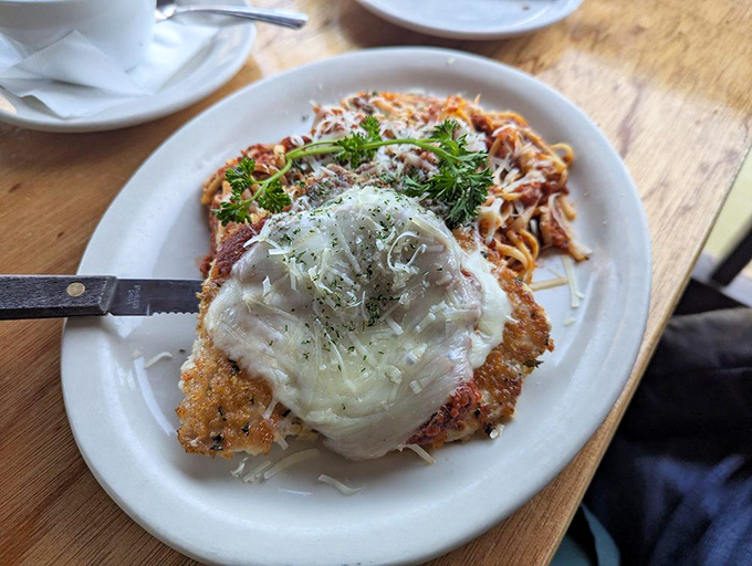 Chicken Parmesan that looks like it could win a beauty pageant and the talent competition. That melted cheese pull should have its own Instagram account.