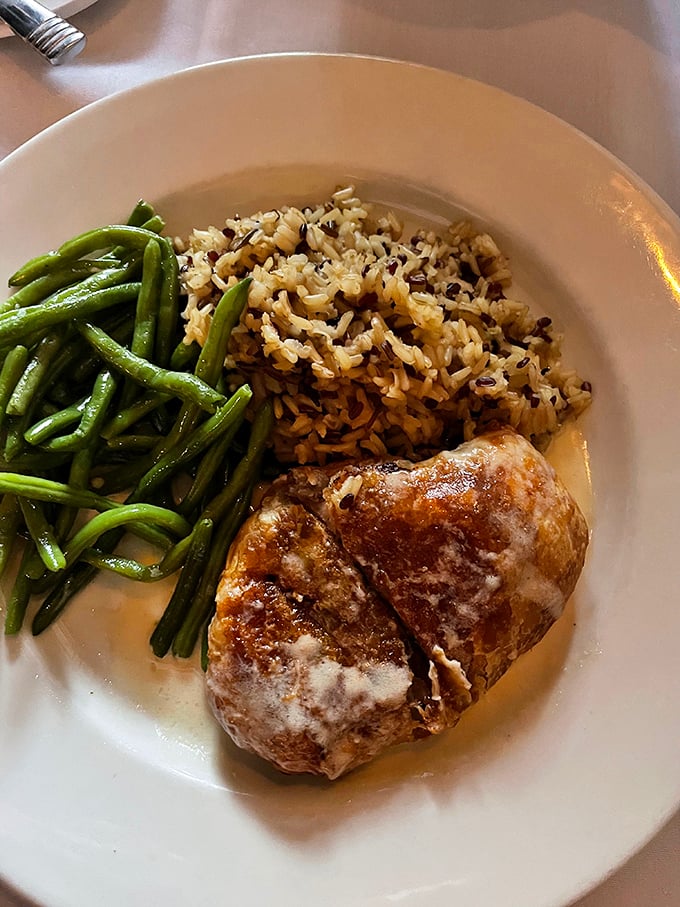 Not to be outdone by its beefy cousin, the Chicken Wellington proves that poultry can dress up and steal the spotlight too.