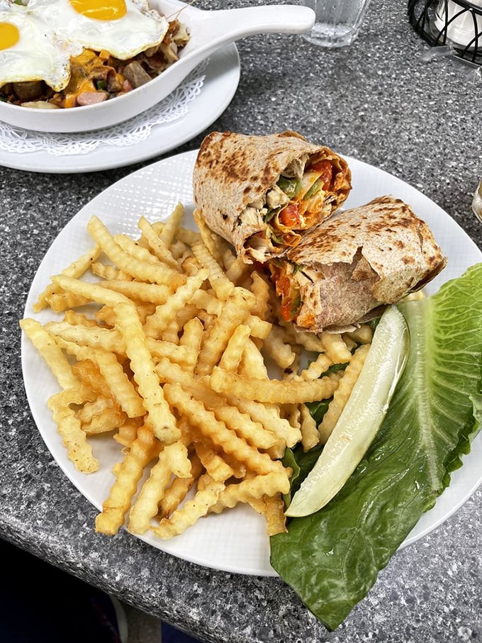 This wrap isn't just lunch&mdash;it's architectural brilliance with crispy fries that could make a Frenchman weep with joy.