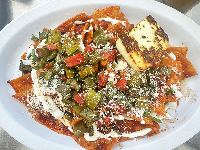 These chilaquiles aren't messing around&mdash;crispy tortilla chips smothered in sauce, cheese, and vegetables create the breakfast fiesta you deserve.