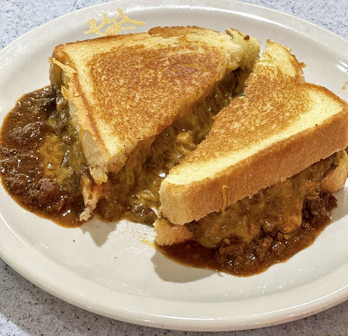 The chili melt&mdash;where grilled cheese meets Cincinnati's signature sauce in a gooey, messy love affair worth every napkin.
