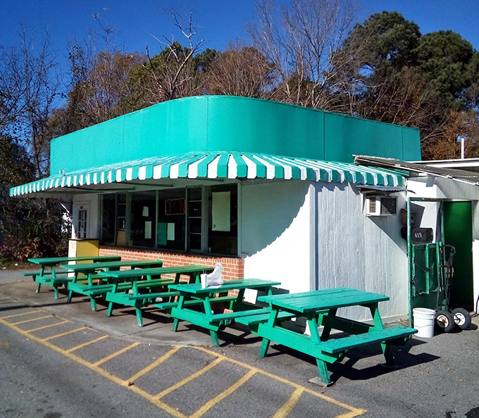 Turquoise charm and picnic tables invite you to slow down and savor. The kind of no-frills spot where the food does all the talking.