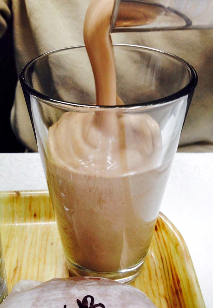 A chocolate milkshake thick enough to require serious straw strength&mdash;dessert and beverage in one glorious glass.