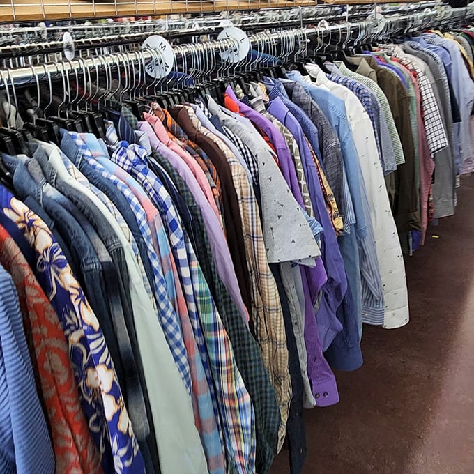 The men's clothing section offers a rainbow of button-downs and casual wear, proving secondhand style can be both sustainable and sophisticated.