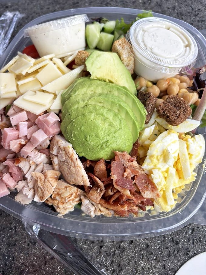Salad that doesn't feel like punishment. This protein-packed bowl transforms "eating your vegetables" from chore to celebration with avocado, eggs, and multiple proteins.