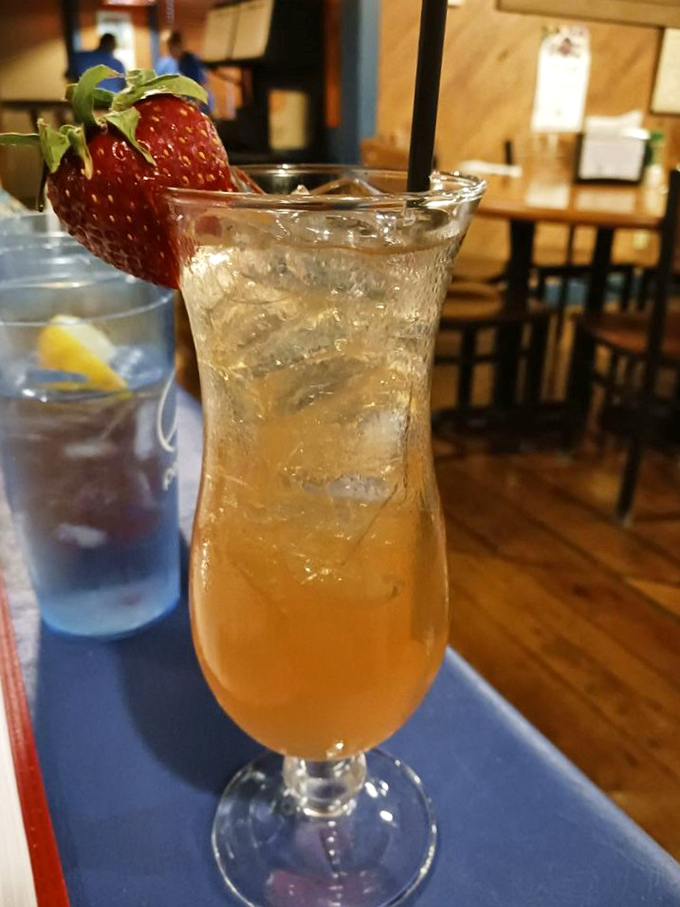 Sunshine in a glass with a strawberry crown. This cocktail isn't just a drink, it's Florida's liquid ambassador.