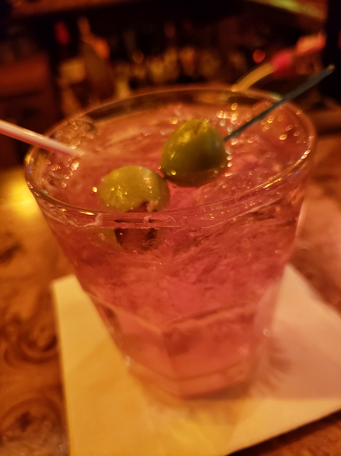 Wisconsin's unofficial state cocktail in its natural habitat. This brandy old fashioned sweet is garnished with the traditional cherries and orange.