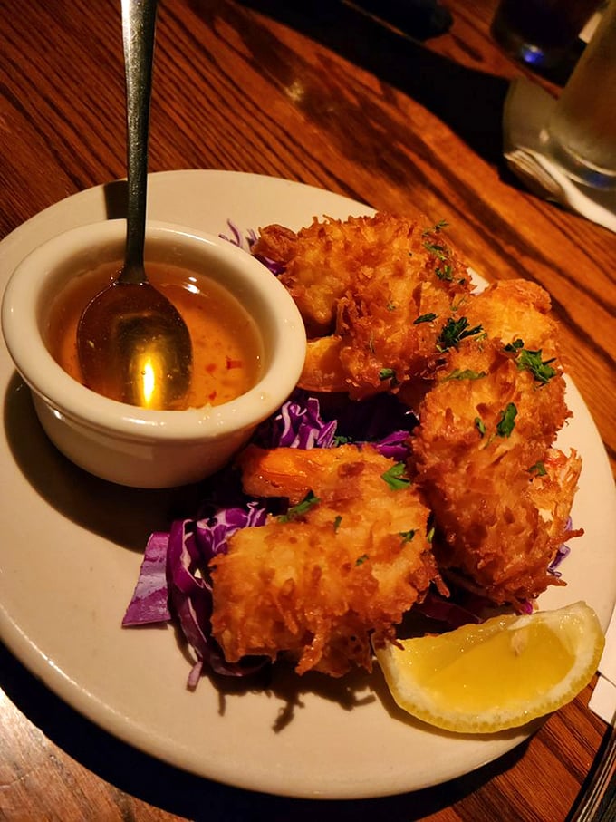 Coconut shrimp: where tropical vacation dreams meet Midwestern appetite reality, complete with a dipping sauce that deserves its own Instagram.