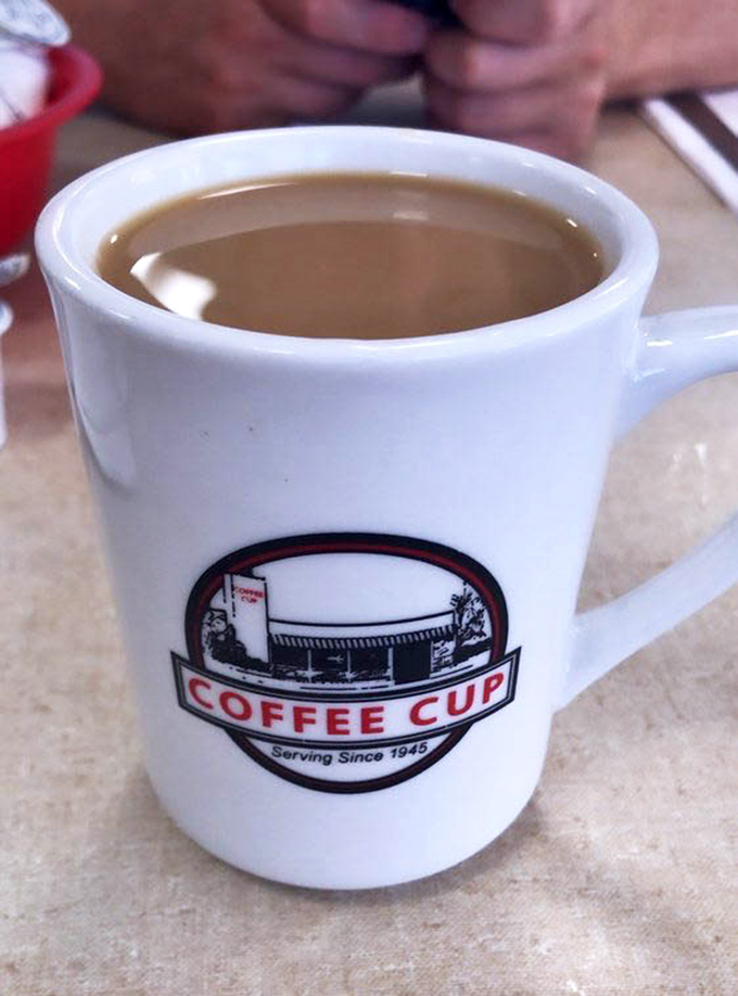 Coffee served in proper mugs that feel substantial and keep conversations flowing freely.