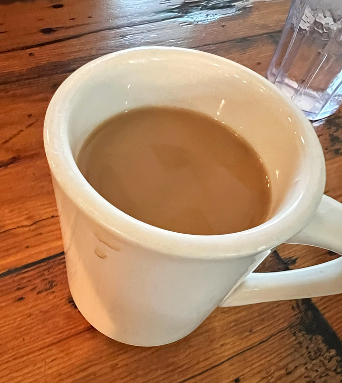 The humble diner coffee mug &ndash; steadfast companion to countless conversations and newspaper crosswords. No fancy latte art needed when the coffee's this good.